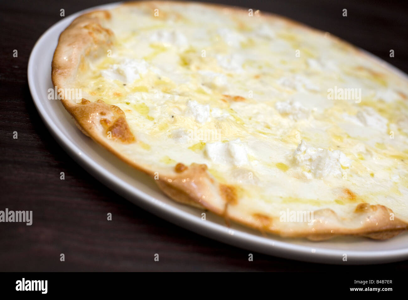 Six cheese pizza Stock Photo - Alamy