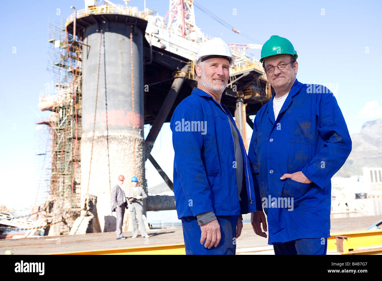 Two construction engineers standing together Stock Photo - Alamy