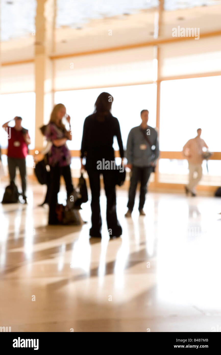 group of people waiting Stock Photo - Alamy