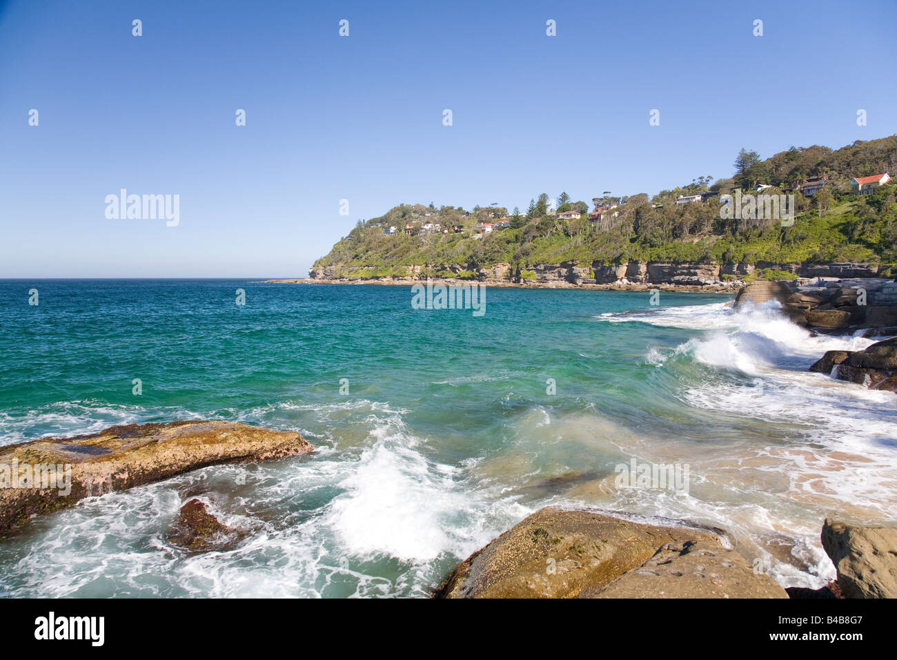 rocks and wild surf at whale beach, north sydney,australia Stock Photo ...