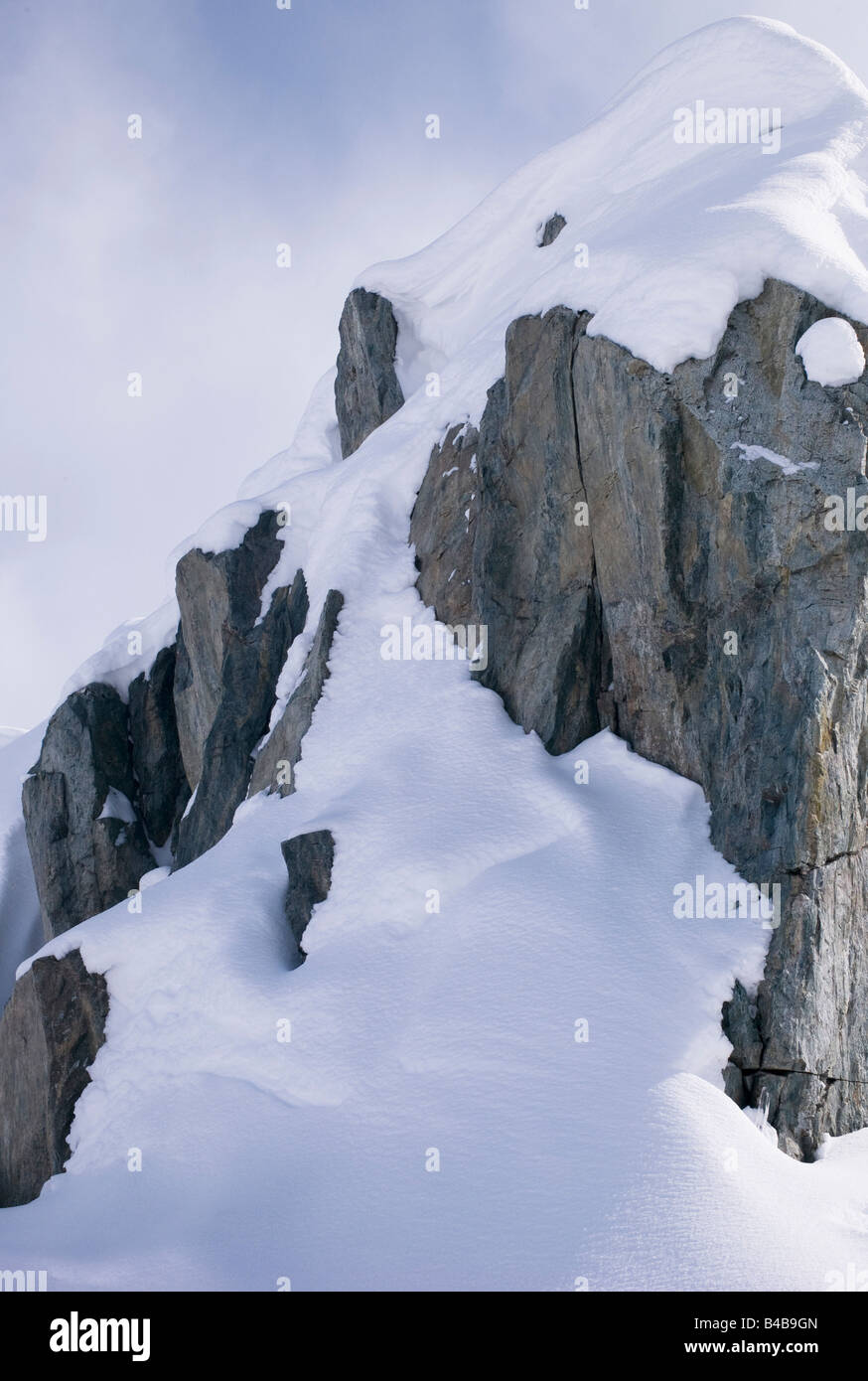 Cliffs covered in snow hi-res stock photography and images - Alamy