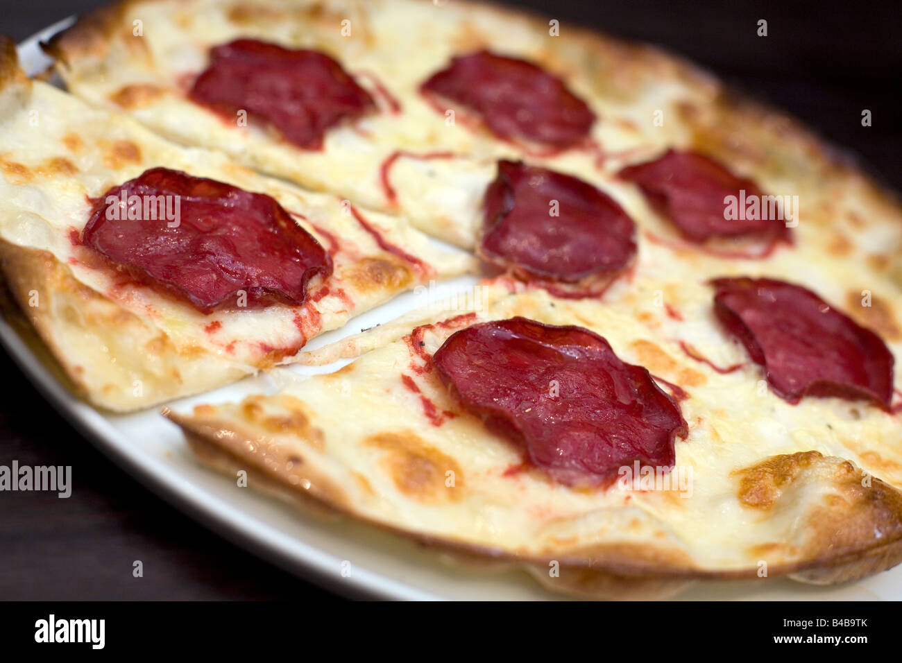 Spicy Pastrami and cheese pizza Stock Photo - Alamy