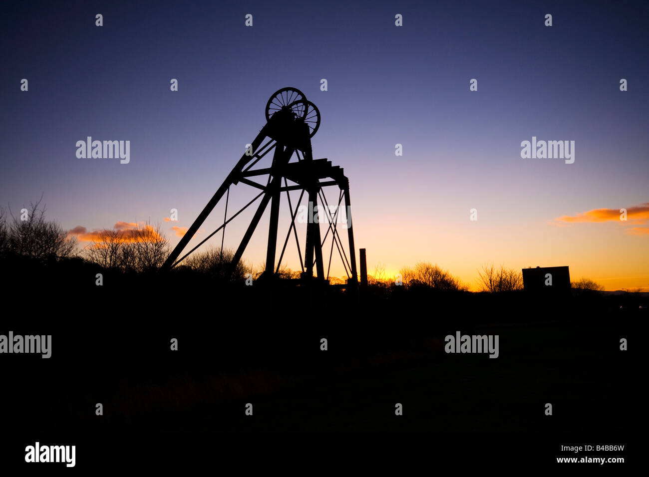 Old coal mine at sunset Stock Photo - Alamy