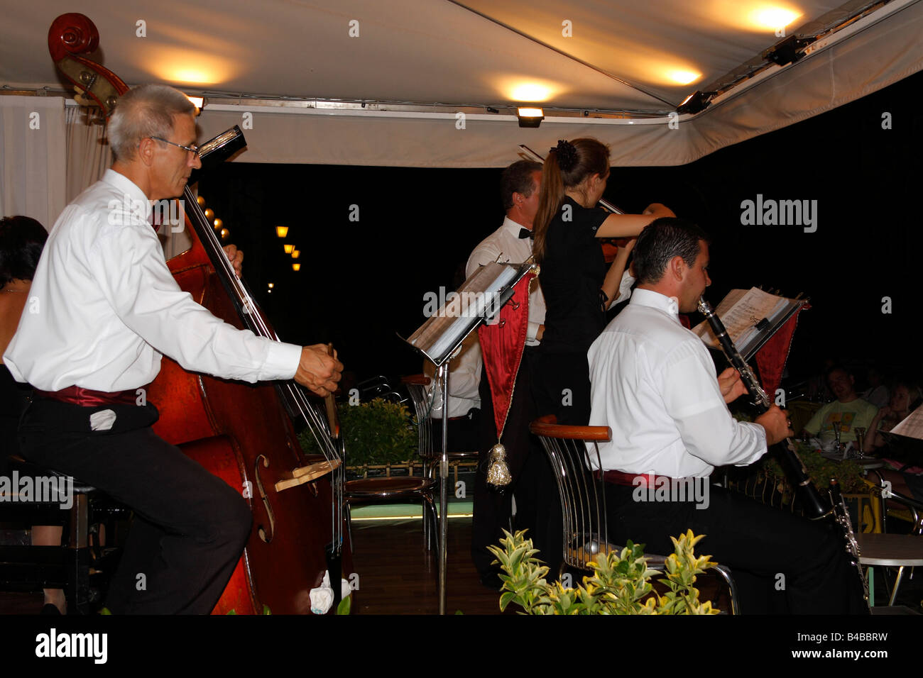 Classical music band playing in a restaurant located in San Marco (St ...