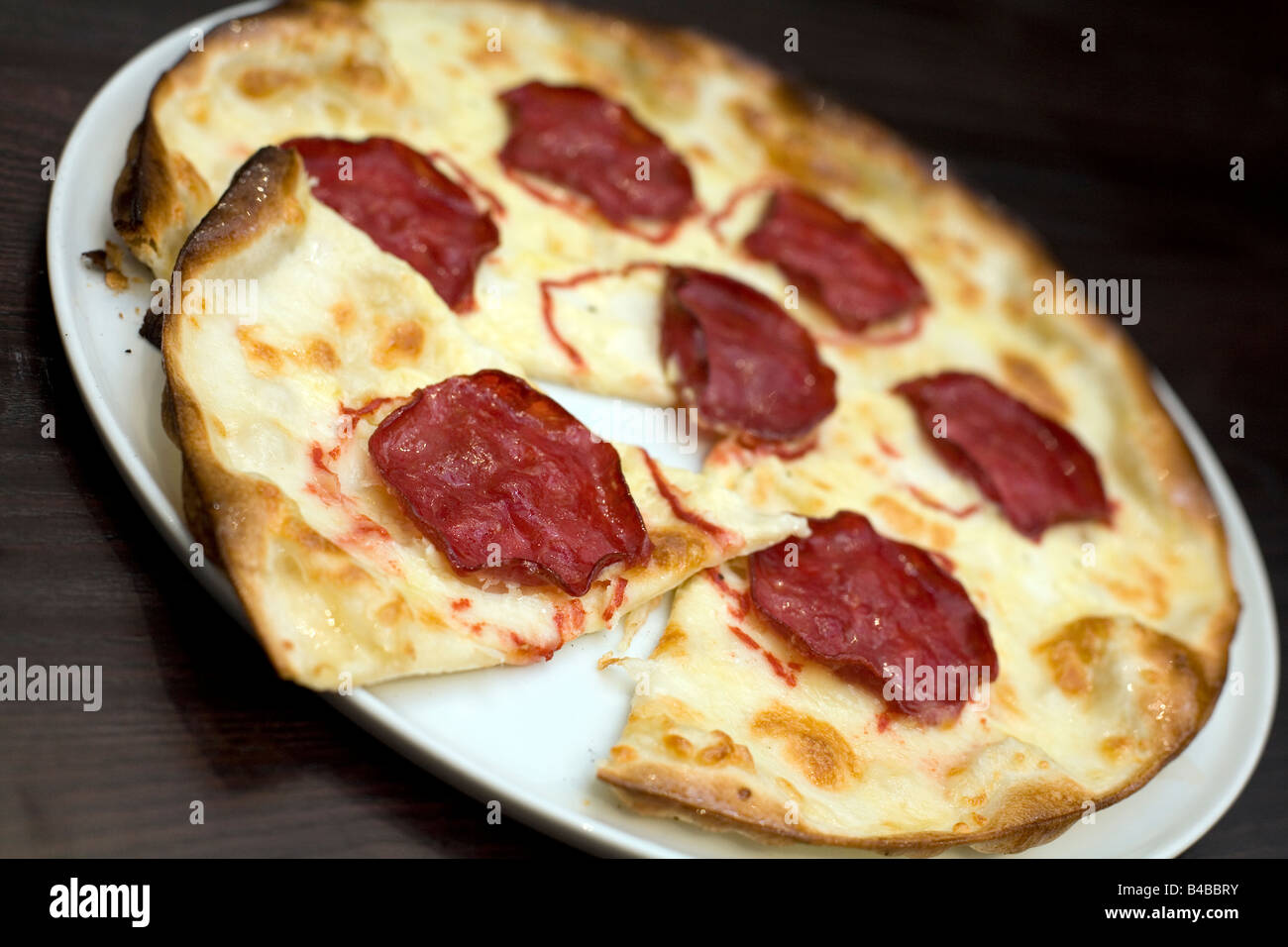 Spicy Pastrami and cheese pizza Stock Photo - Alamy