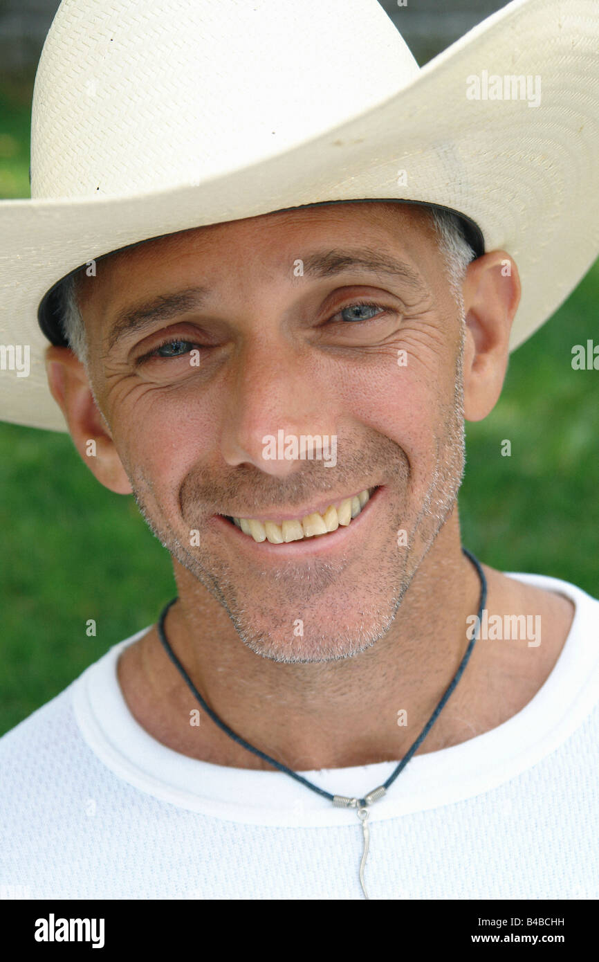 Outdoor Portrait of an Shaven Baby Boomer Aged Man in a Cowboy Hat and ...
