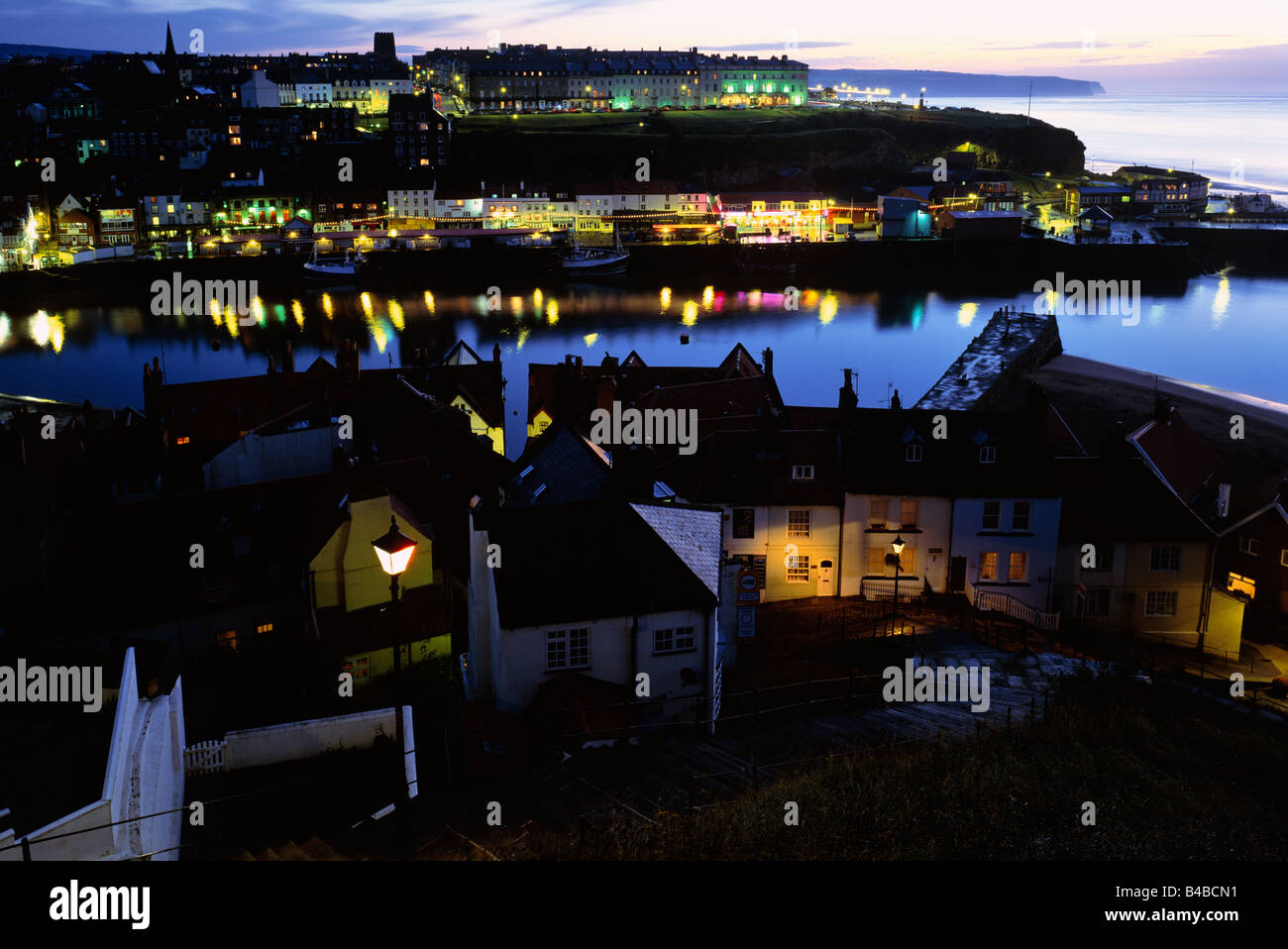 A dusk view looking down on Whitby Harbour Stock Photo - Alamy