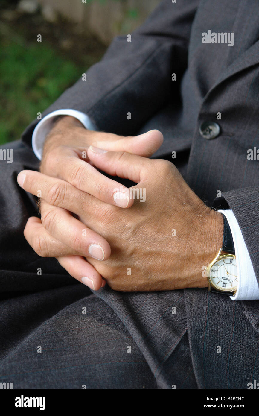 Closeup of a Businessman's Folded Hands on His Lap Copy Space Stock ...