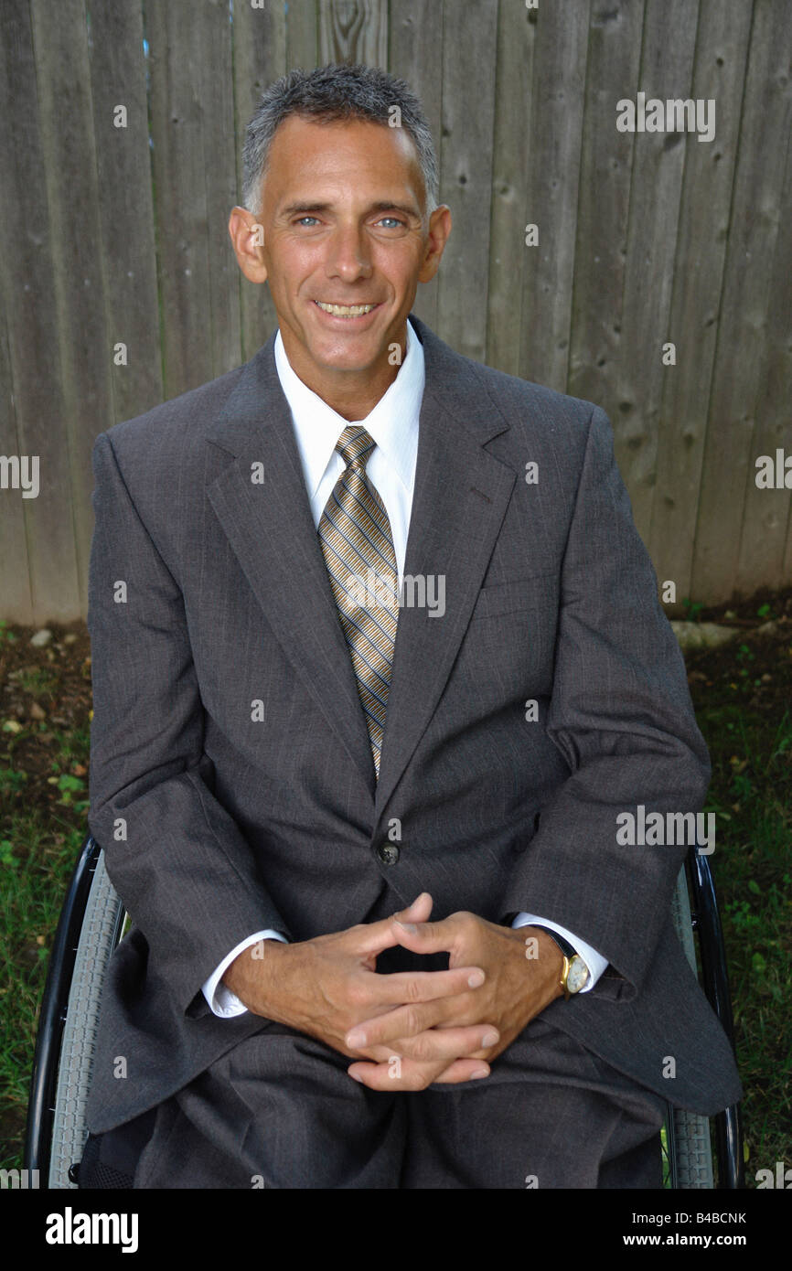 Casual Outdoor Portrait of a Smiling Baby Boomer Aged Businessman in a ...