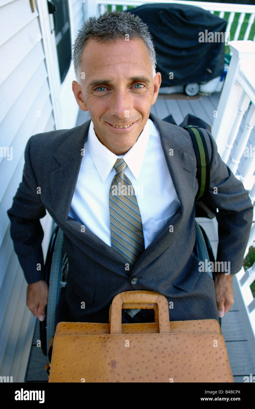 Portrait of a Baby Boomer Aged Businessman in a Wheelchair He is ...