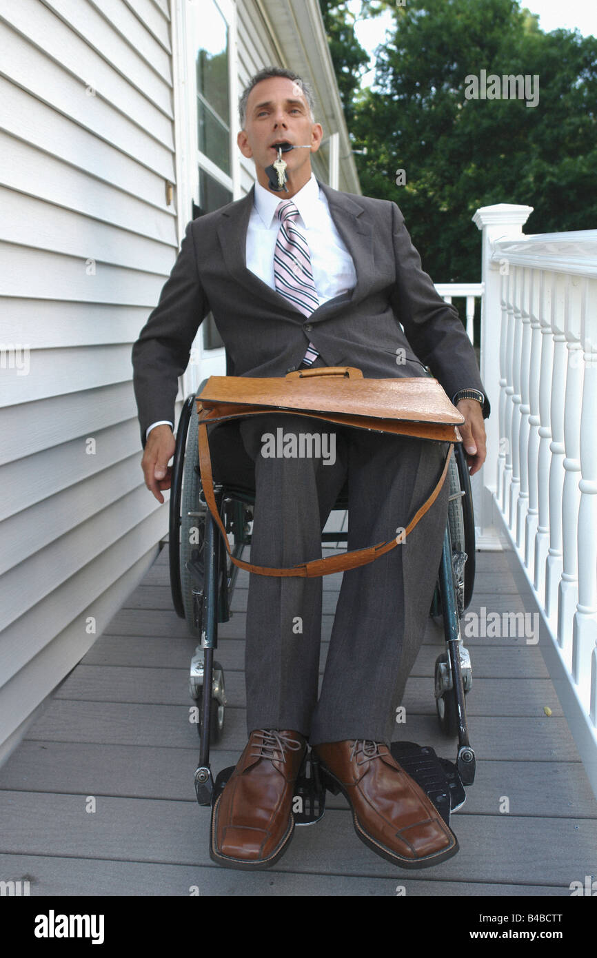 Portrait of a Baby Boomer Aged Businessman in a Wheelchair He is ...