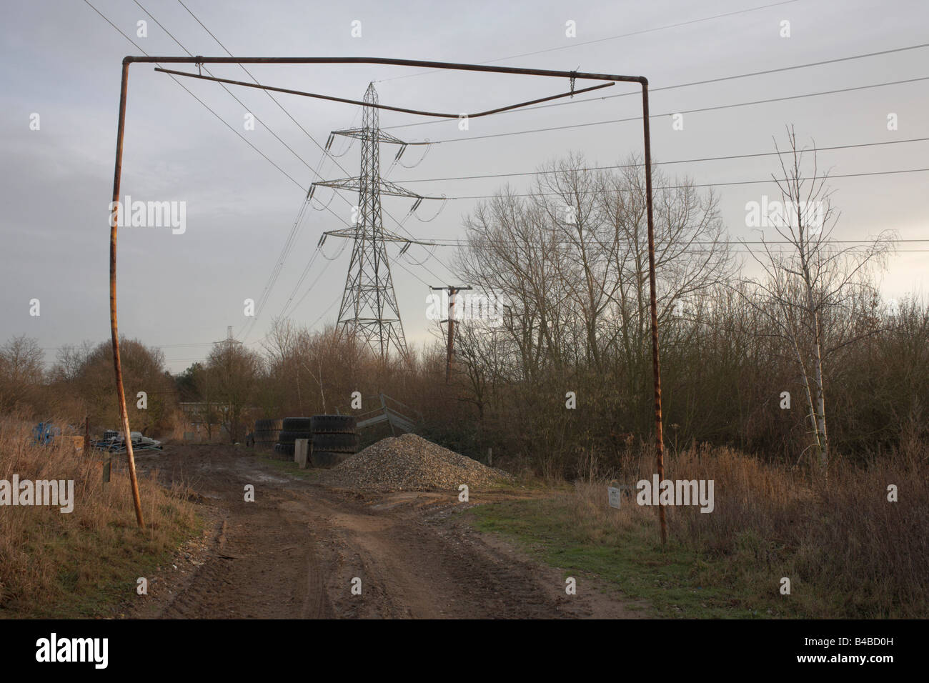 An L6 electricity pylon stands framed in square shape of height ...