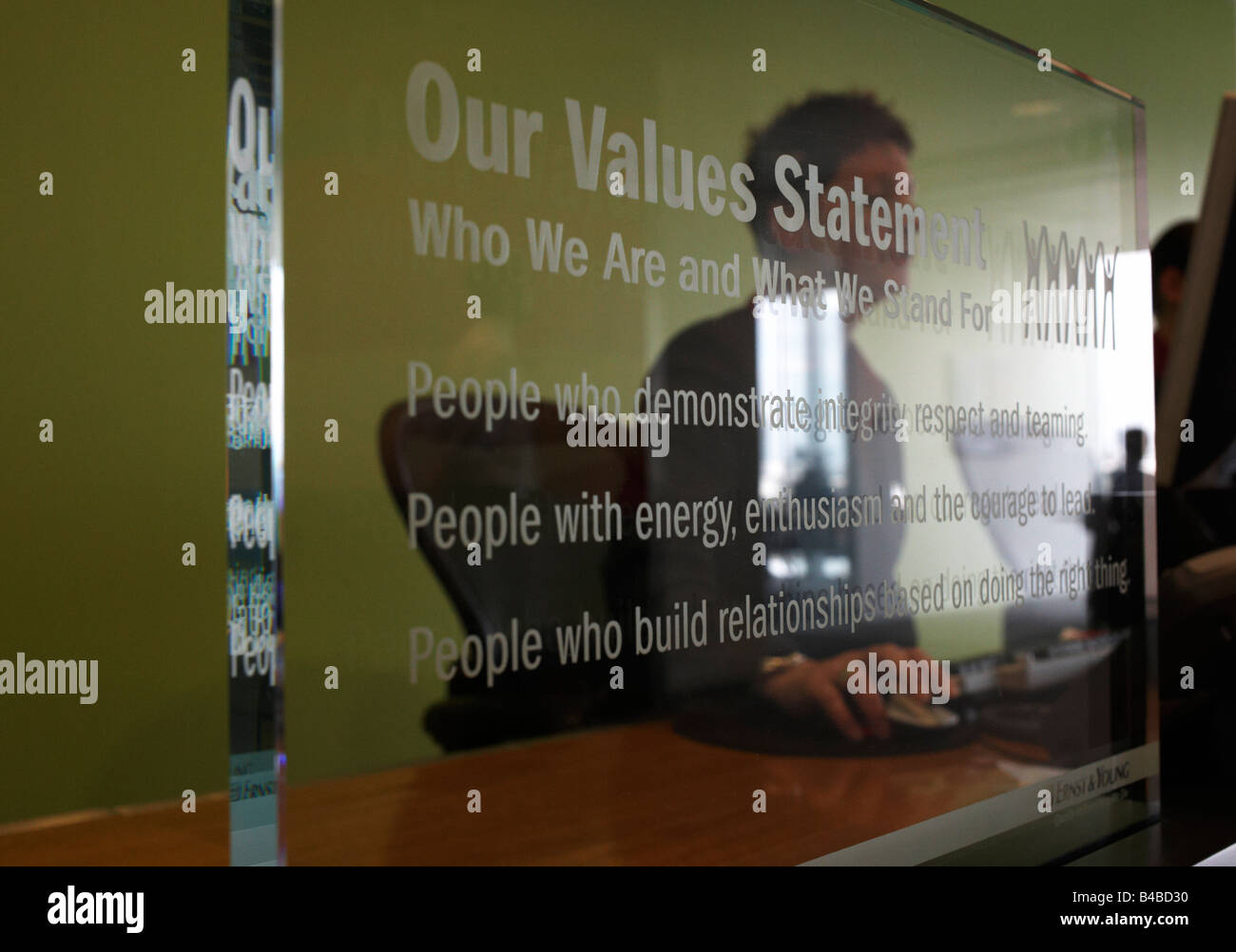 Corporate values statement written onto transparent screens at an ...