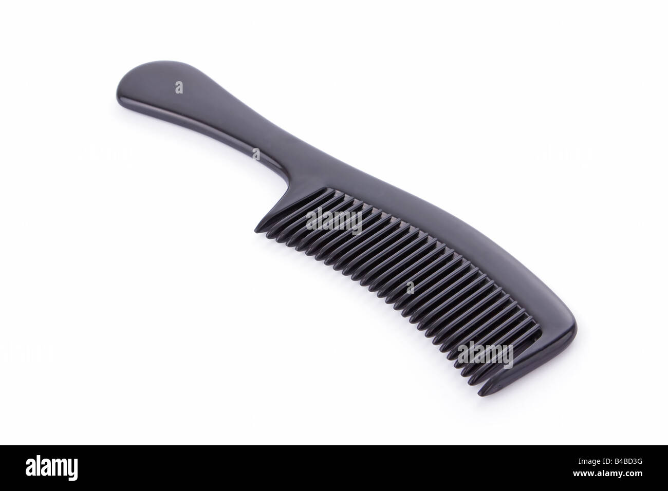 Black comb isolated on a white background Stock Photo - Alamy