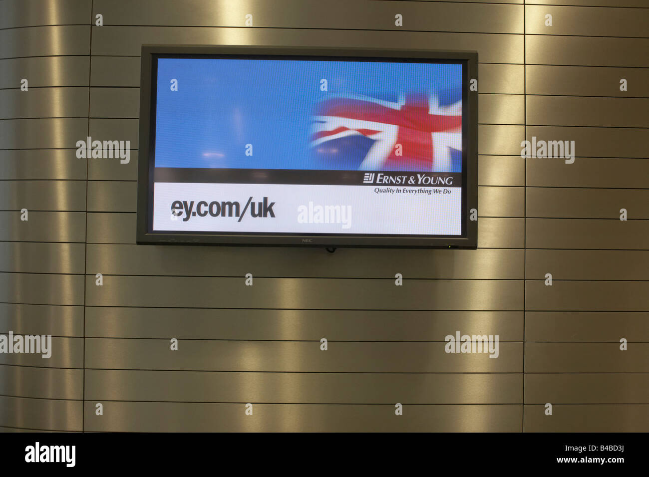 TV screen displaying corporate logo greeting message at main entrance ...