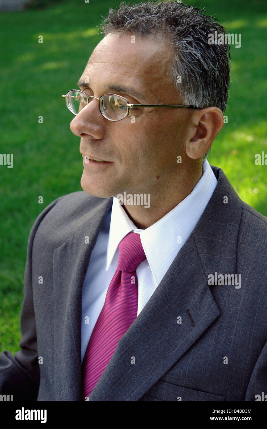 Outdoor Portrait of a Baby Boomer Aged Businessman Wearing Eyeglasses ...
