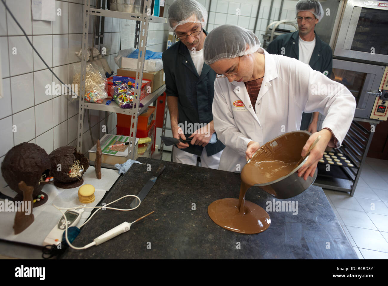 Pouring experimental biscuit chocolate in the United Biscuits owned ...