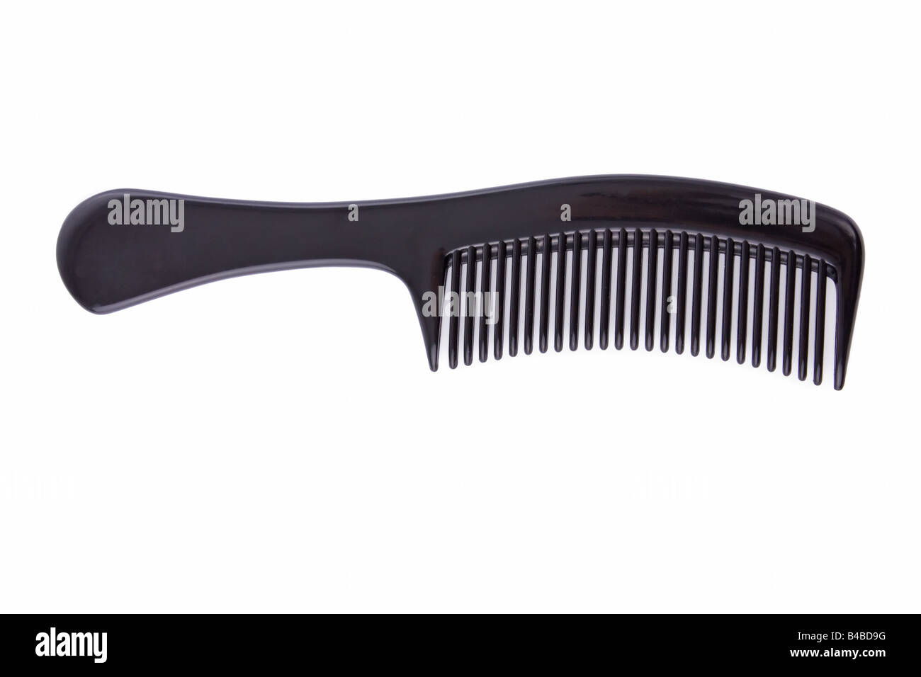 Black comb isolated on a white background Stock Photo - Alamy