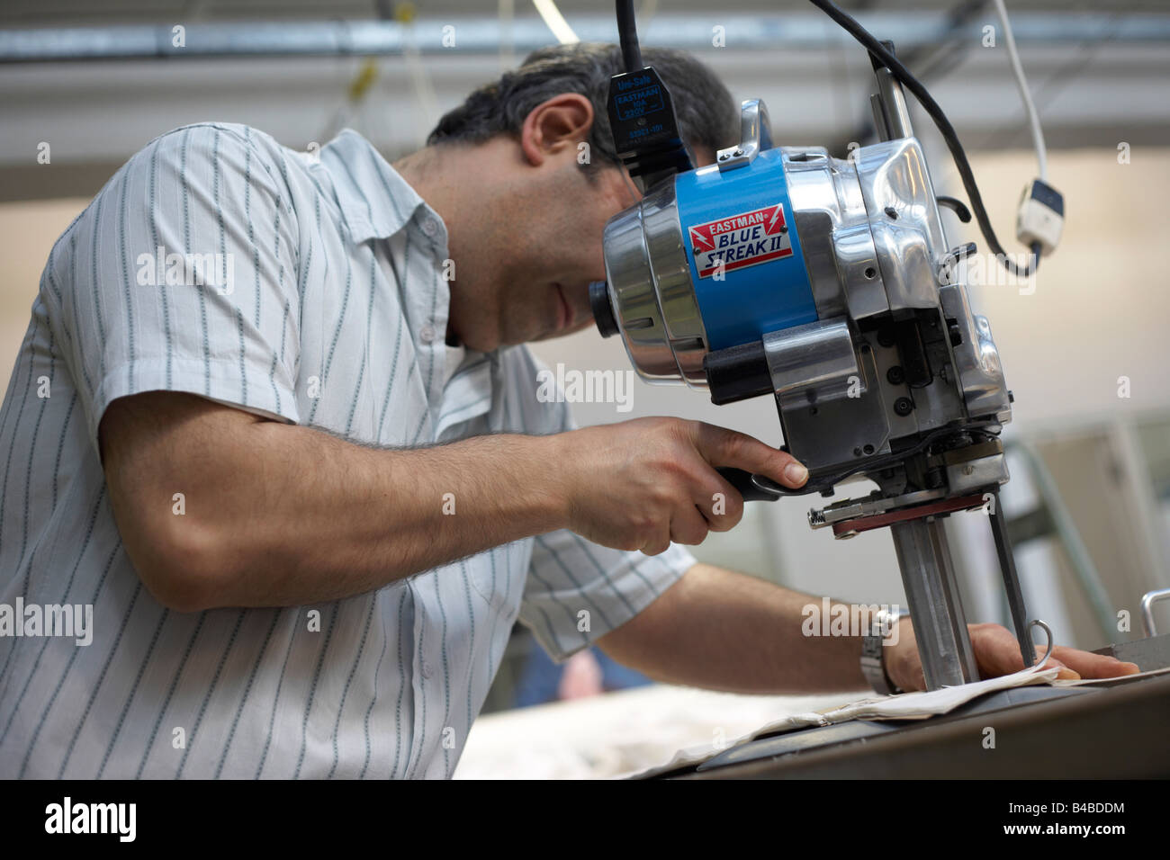 Machinist tailor factory couture man hi-res stock photography and ...