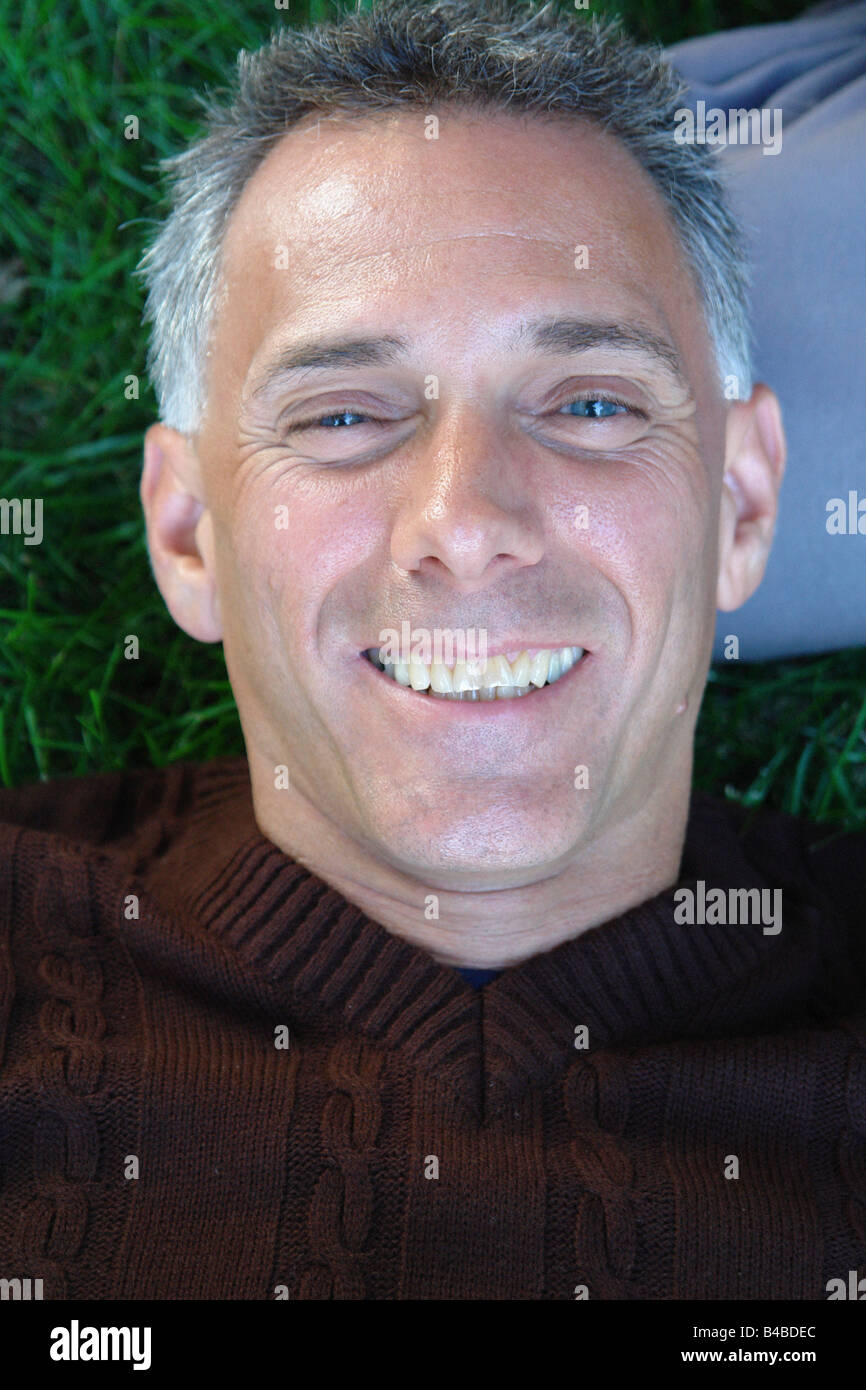 Casual Outdoor Portrait of a Baby Boomer Aged Man Wearing a Brown ...