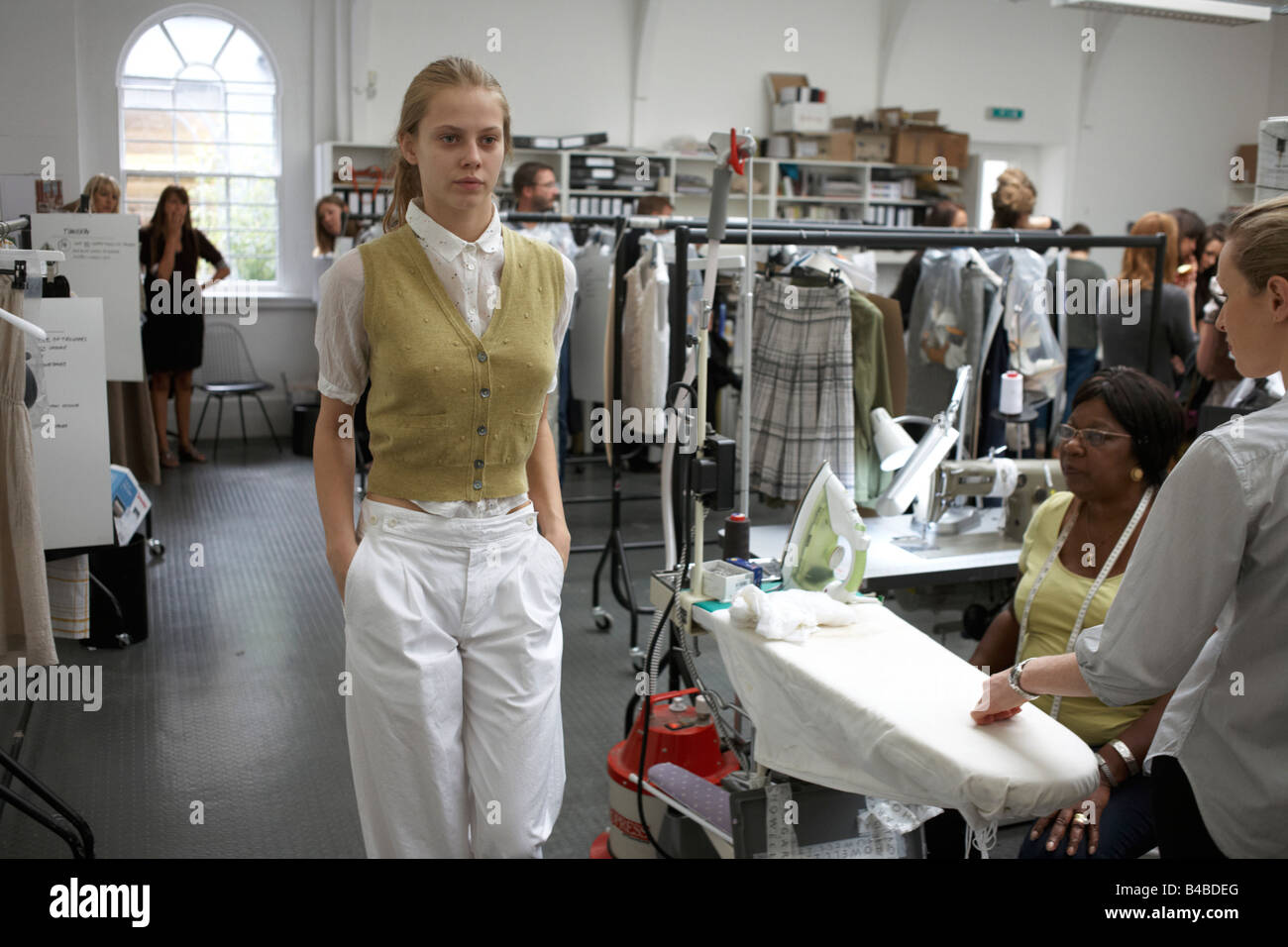 Model shows clothes to staff before couture designer Margaret Howell's ...