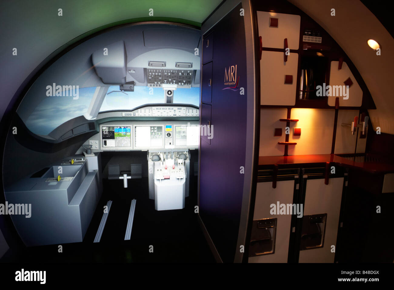 Full-size mock-up of a Mitsubishi Regional Jet (MRJ) cockpit and cabin ...