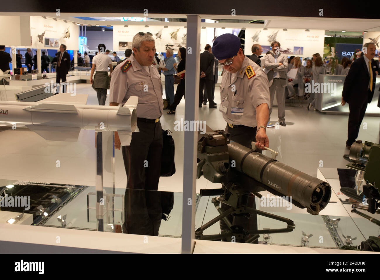 Two military officers from Ecuador admire an air-to-ground 'PARS 3 LR ...