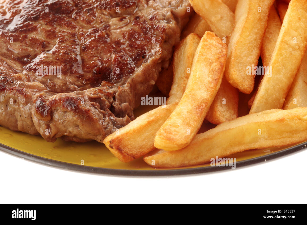 Freshly Cooked Sirloin Beef Steak And Chips Served On A Plate Isolated ...