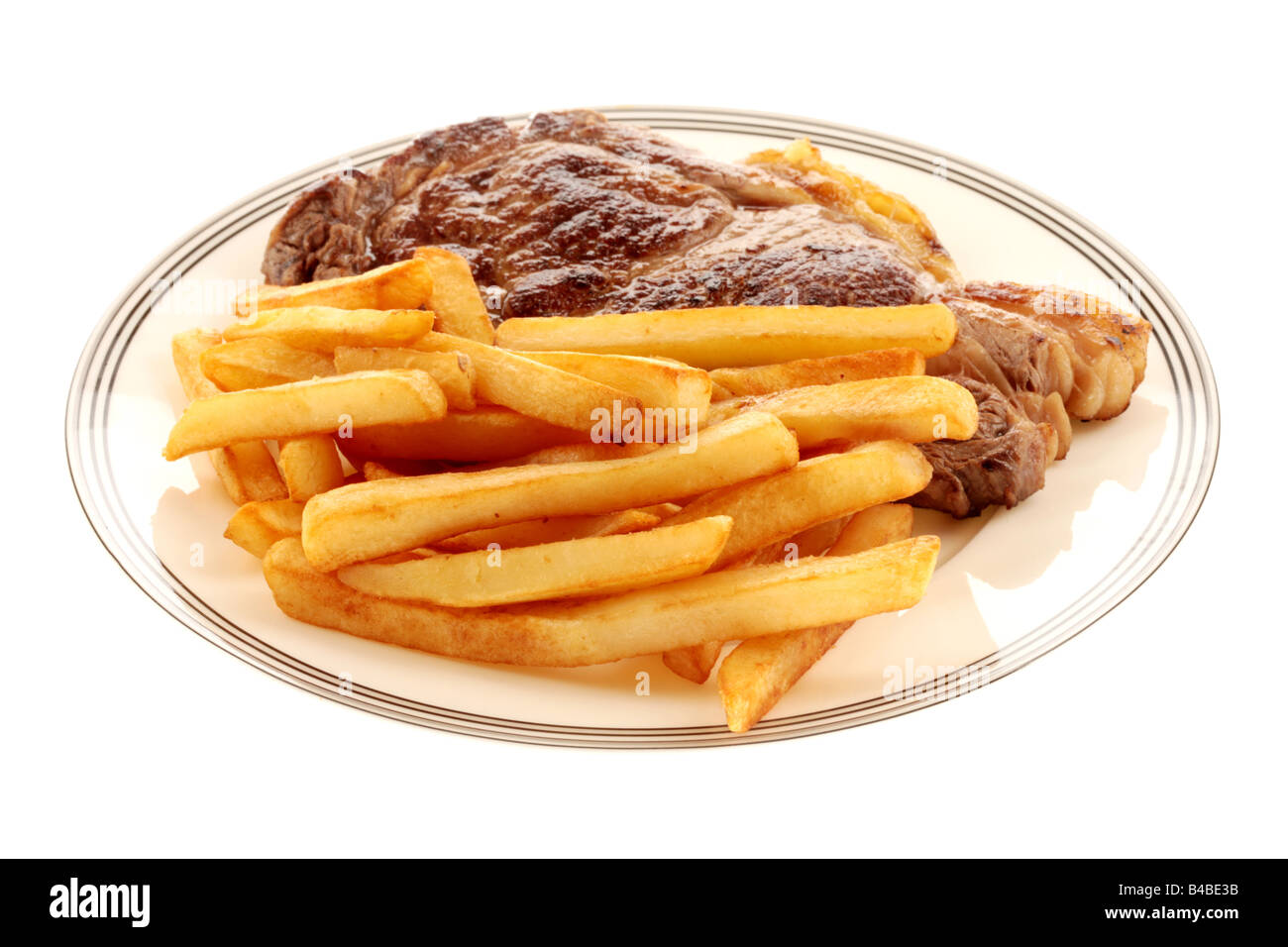 Freshly Cooked Sirloin Beef Steak And Chips Isolated Against A White ...