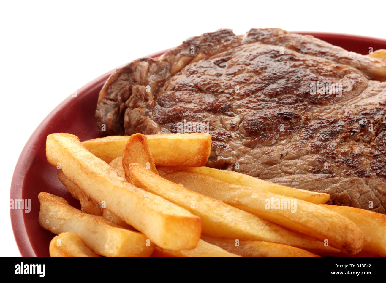 Freshly Cooked Sirloin Beef Steak And Chips Isolated Against A White ...