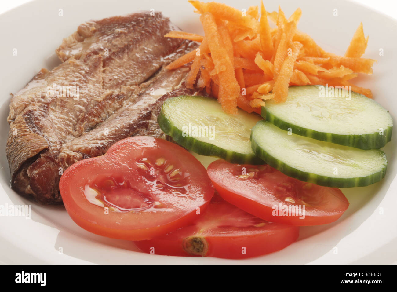 Smoked Kipper with Salad Stock Photo - Alamy