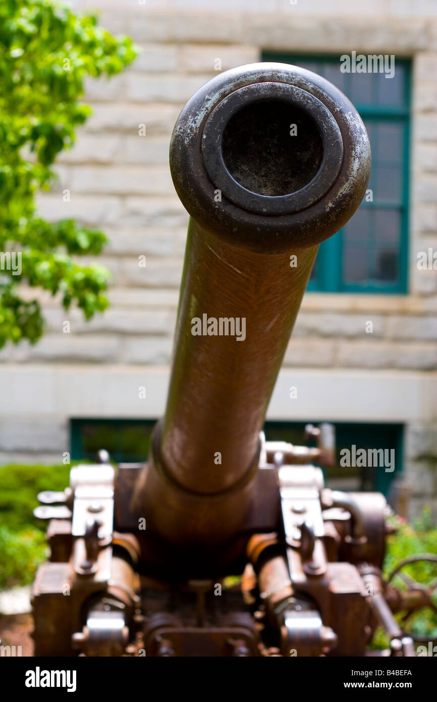 An old cannon mounted in front of a courthouse Stock Photo - Alamy