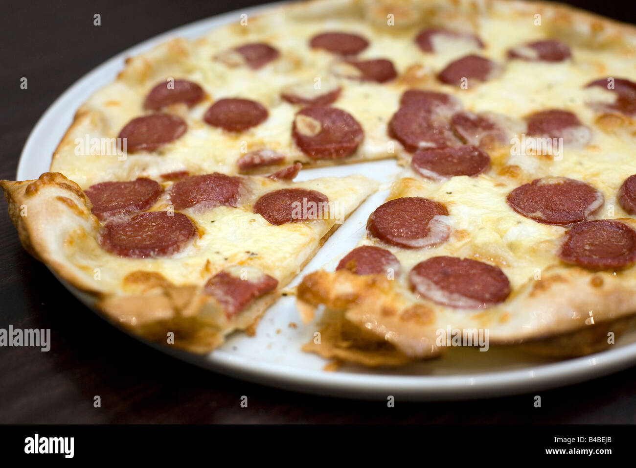 Spicy Sausage and cheese pizza Stock Photo - Alamy