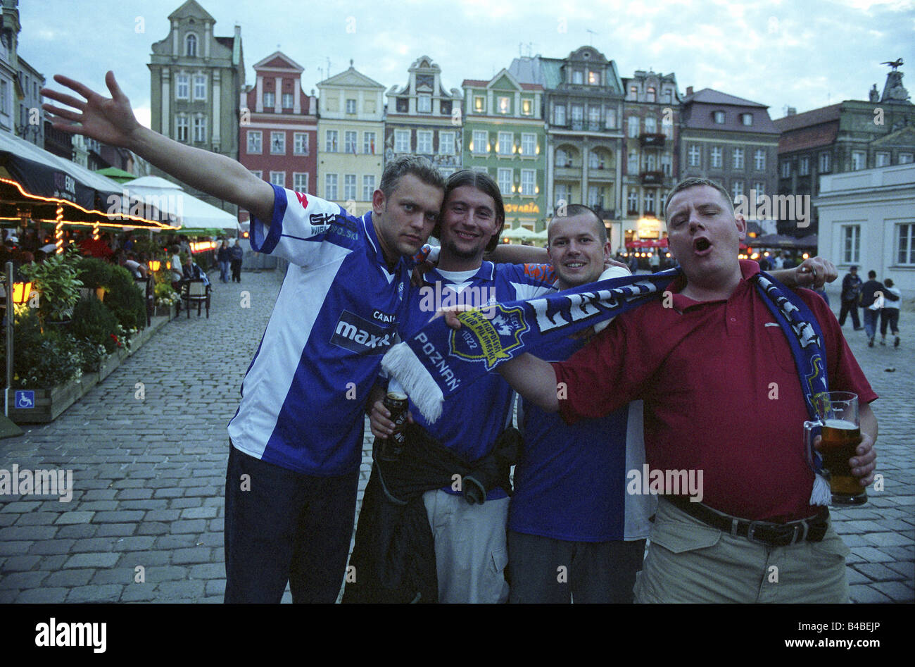 Football fans of Lech Poznan celebrating in the Old Market Square ...