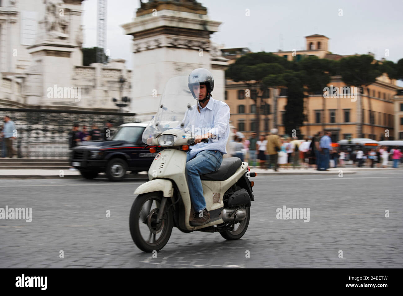 Man on a scooter Rome Italy Stock Photo - Alamy