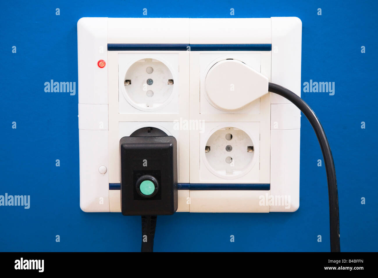 Multiplug electric socket, Power plugs Stock Photo - Alamy
