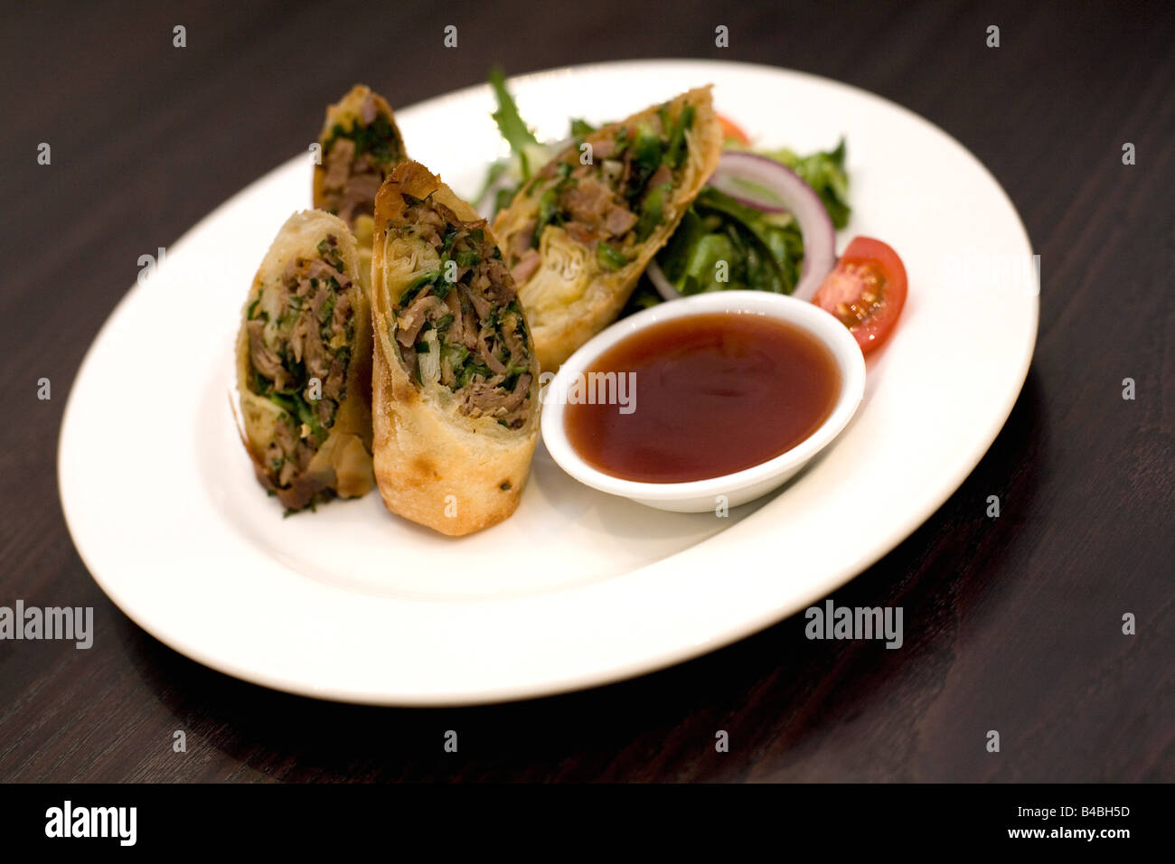 Roasted duck rolls Stock Photo - Alamy