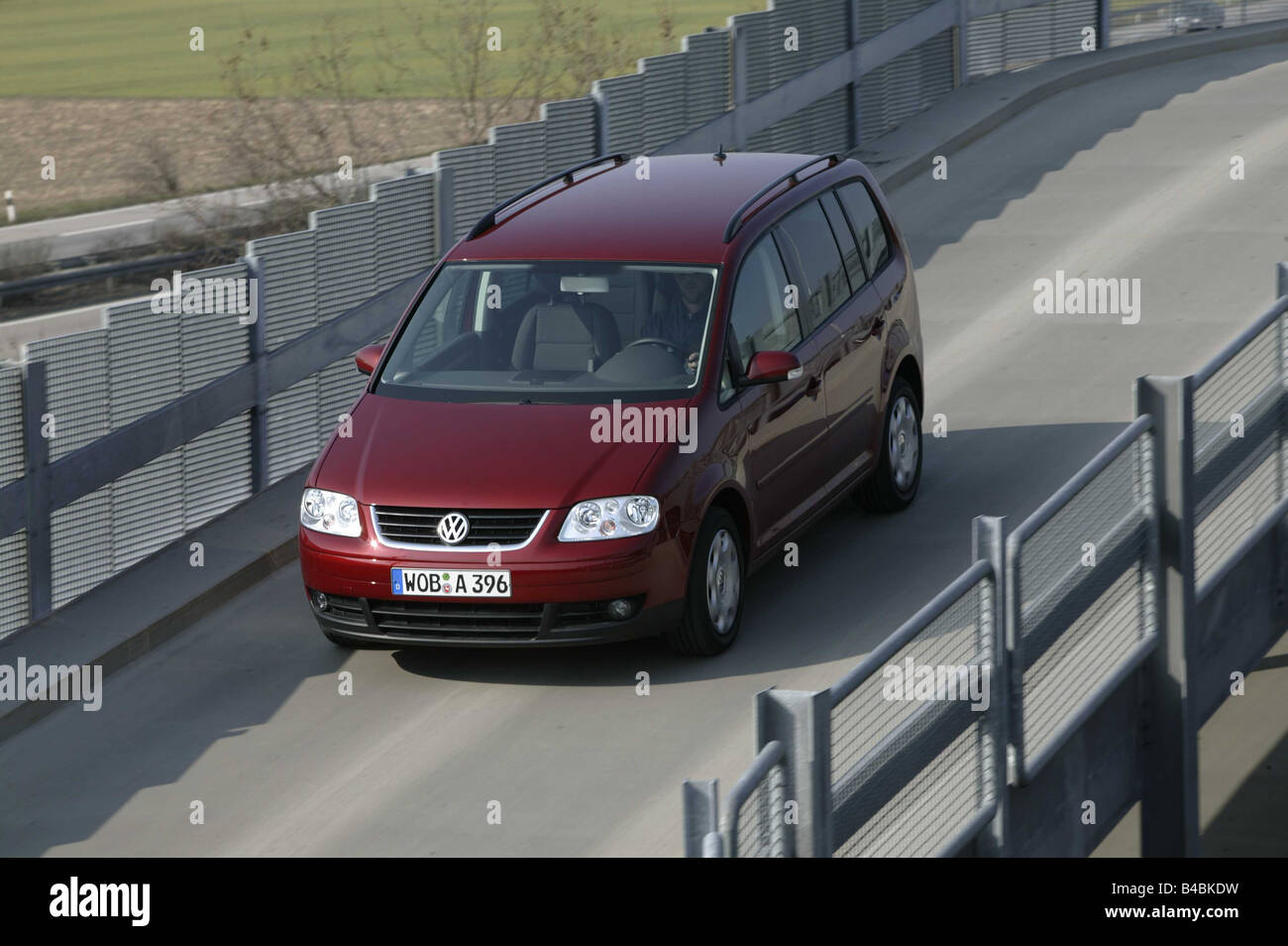 Car, VW Volkswagen Touran, Van, model year 2003-, red, driving ...