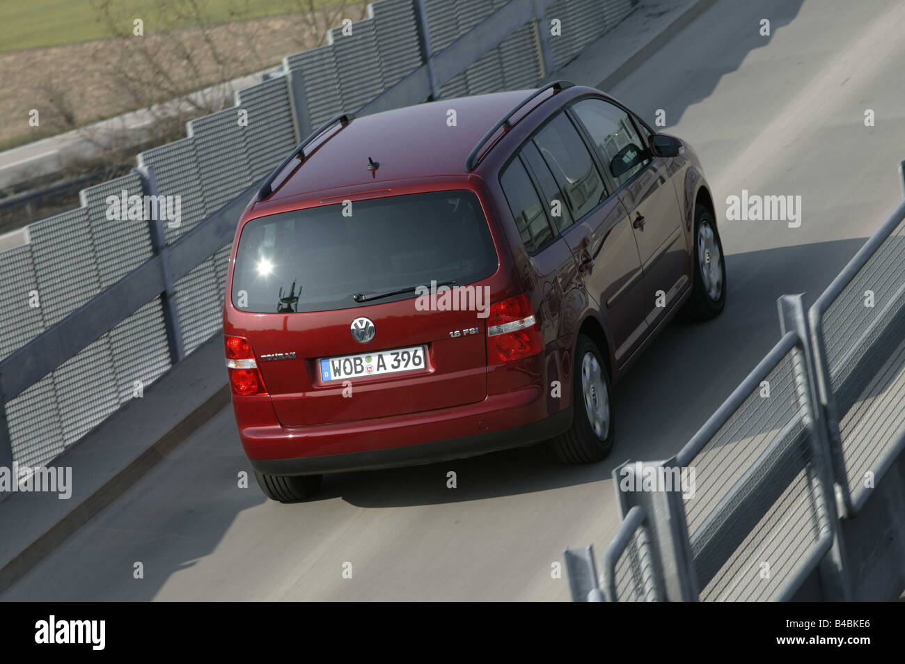 Car, VW Volkswagen Touran, Van, model year 2003-, red, driving ...