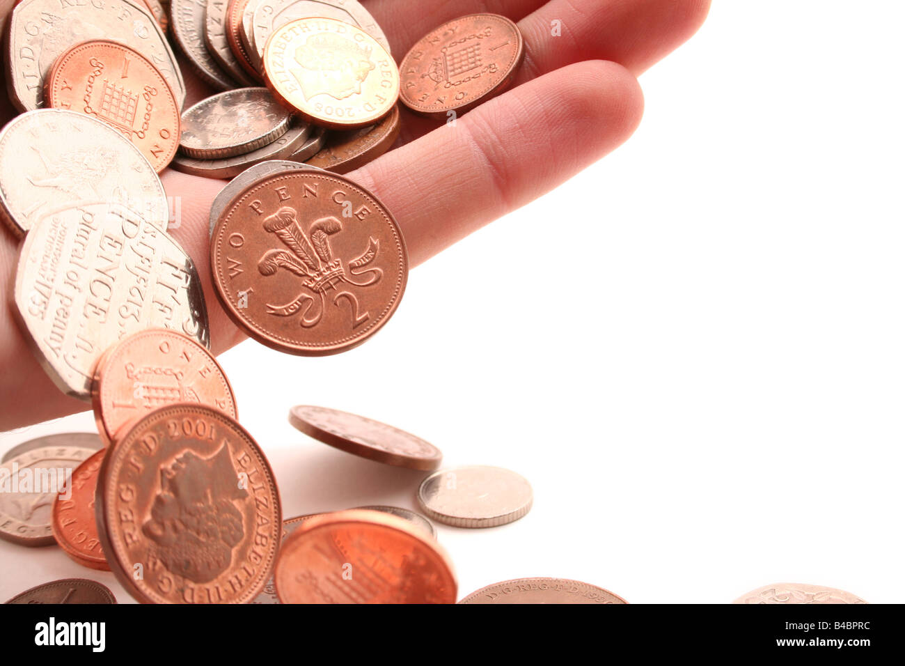 Hand dropping money Stock Photo - Alamy