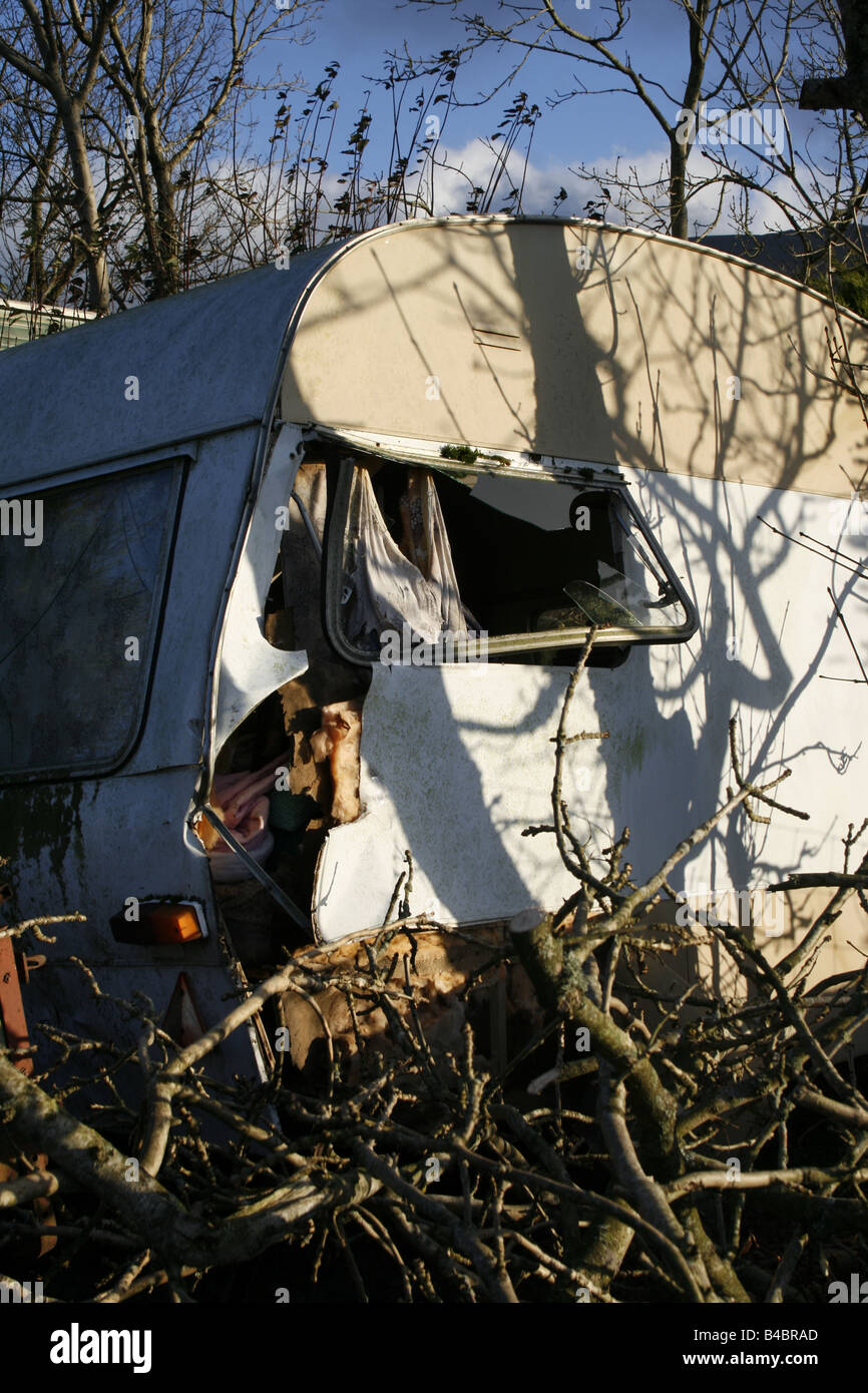 one damaged caravan in woods Stock Photo - Alamy