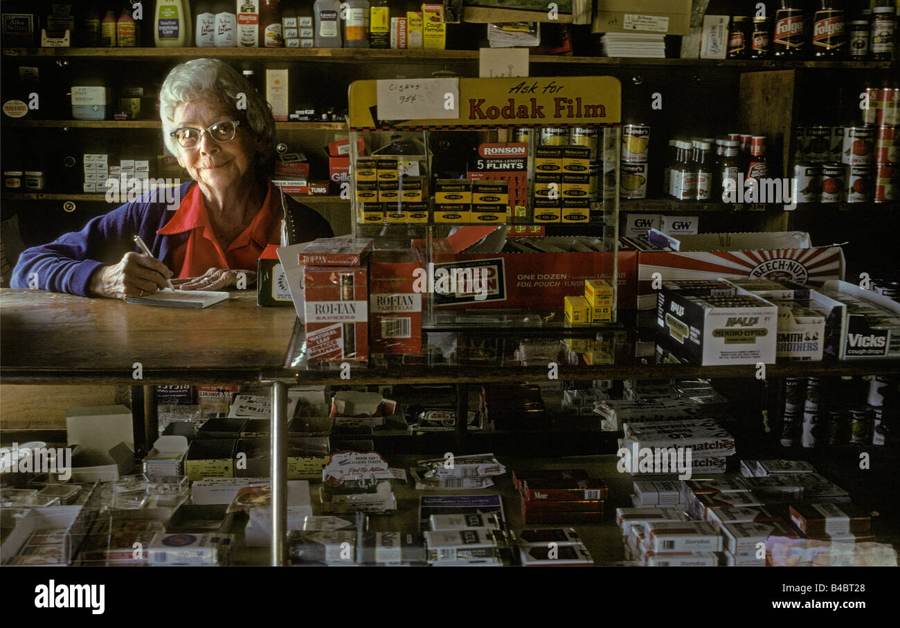 Woman clerk in country store Colorado Stock Photo - Alamy