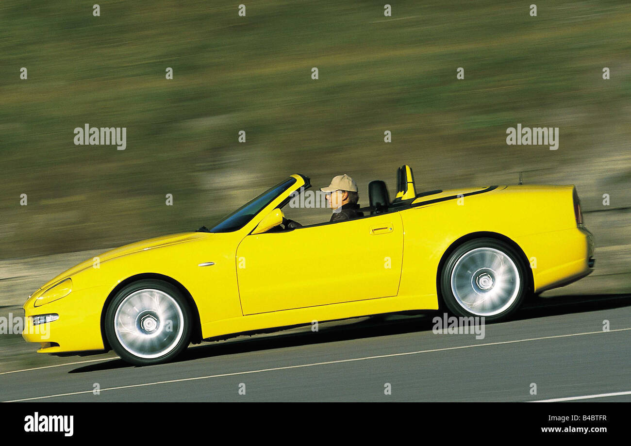 Car, Maserati Spyder, model year 2001-, yellow, driving, side view ...