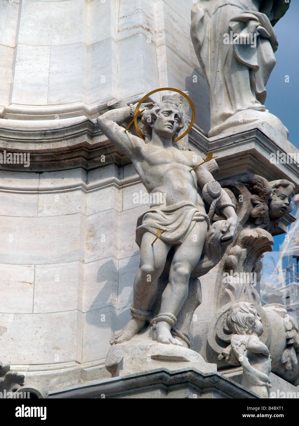 Statue detail on the Holy Trinity Column. Buda Castle district in ...