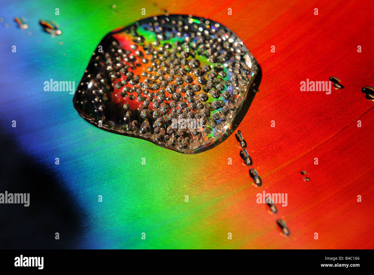 Bubbles and droplets on surface of Lazer disk Stock Photo - Alamy