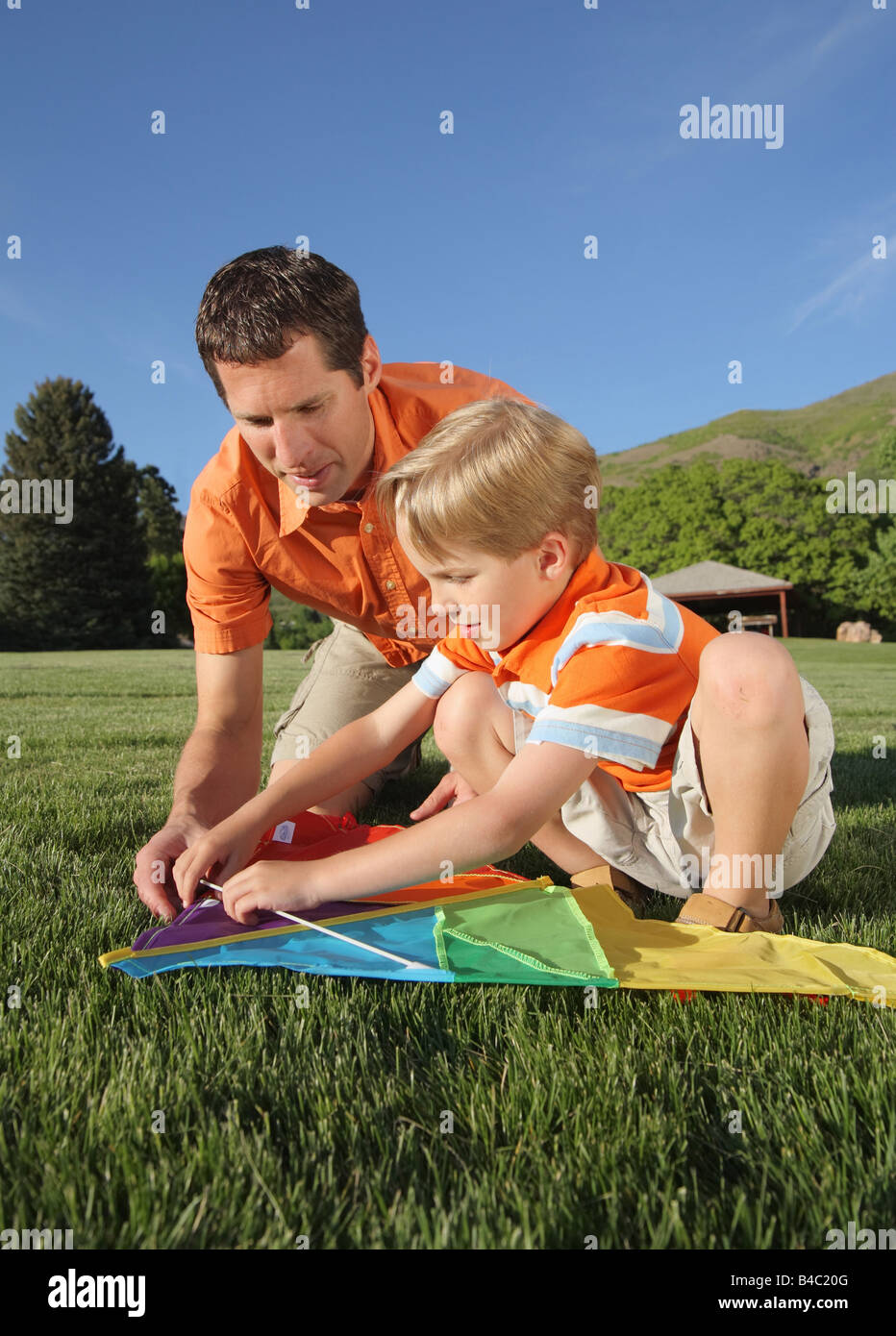 Child boy build kite hi-res stock photography and images - Alamy