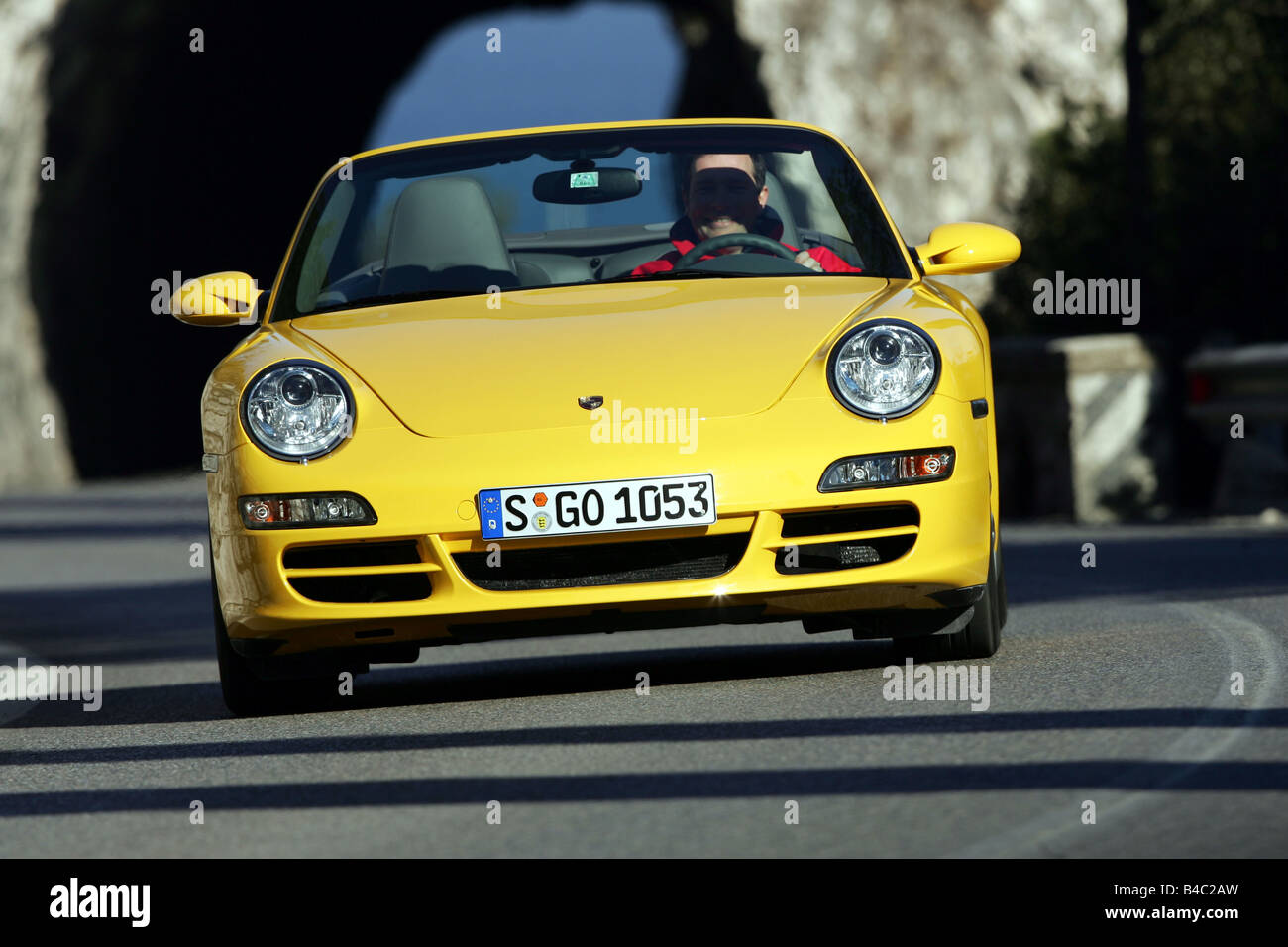 Car, Porsche 911 Carrera Convertible, model year 2005-, yellow, driving ...
