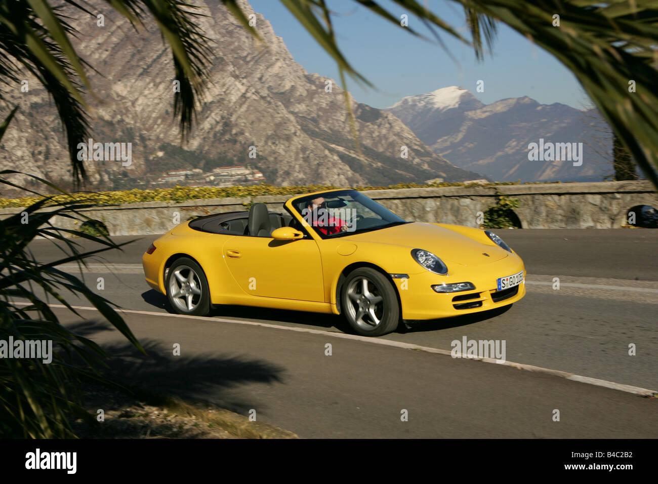 Car, Porsche 911 Carrera Convertible, model year 2005-, yellow, driving ...