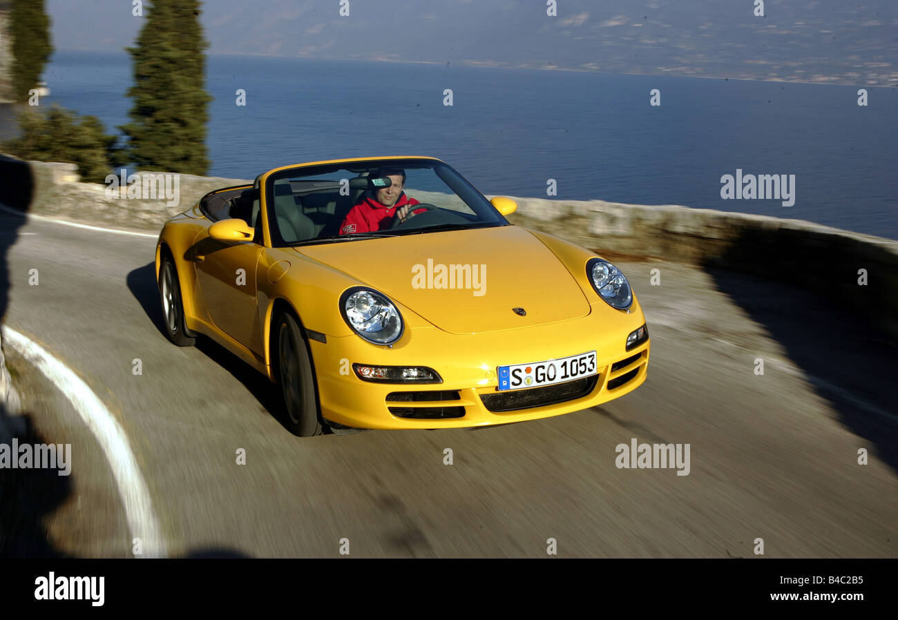 Car, Porsche 911 Carrera Convertible, model year 2005-, yellow, driving ...