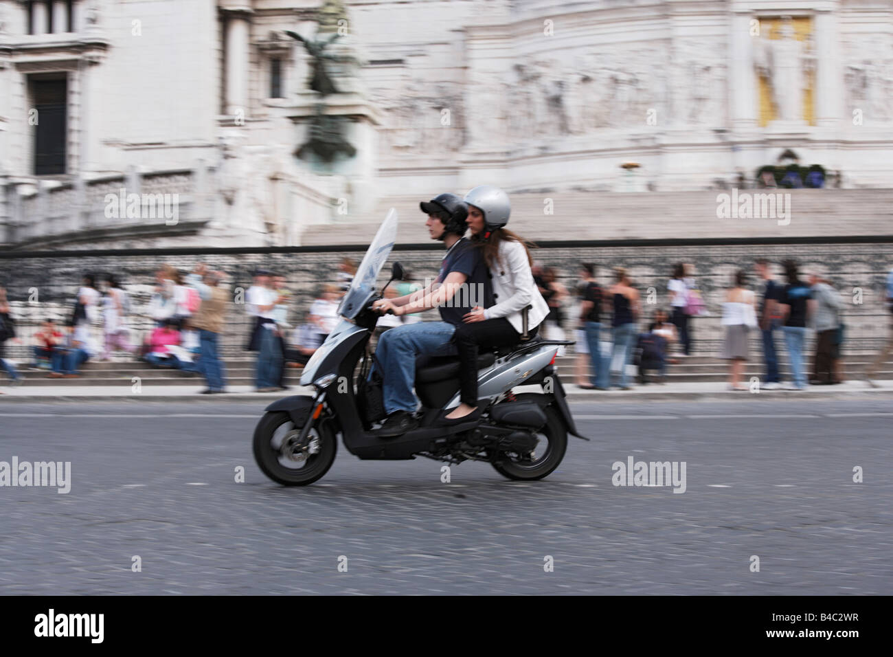 Couple on a scooter Rome Italy Stock Photo - Alamy